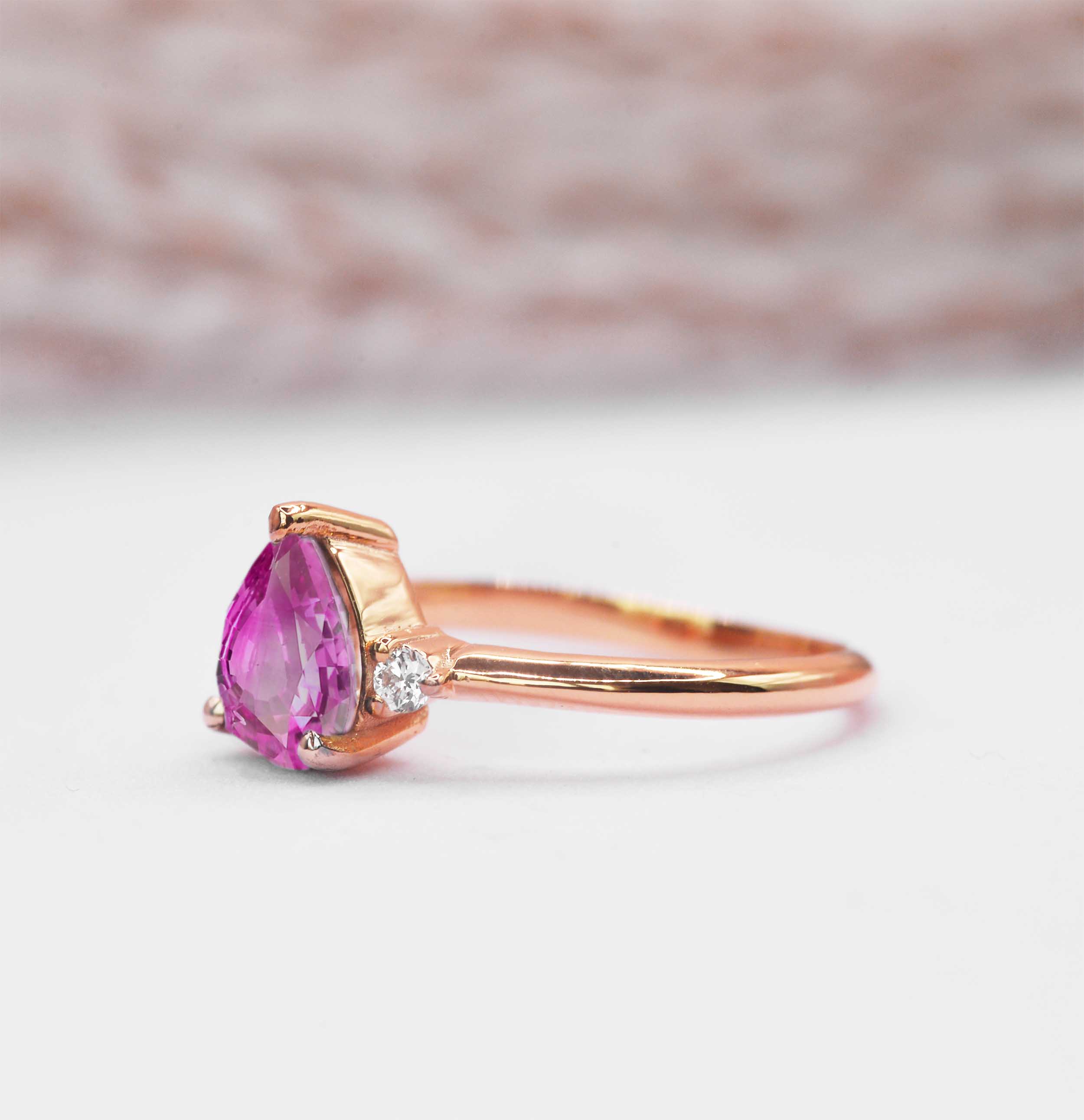 pear pink sapphire ring in minimal Style - DIORAH JEWELLERS